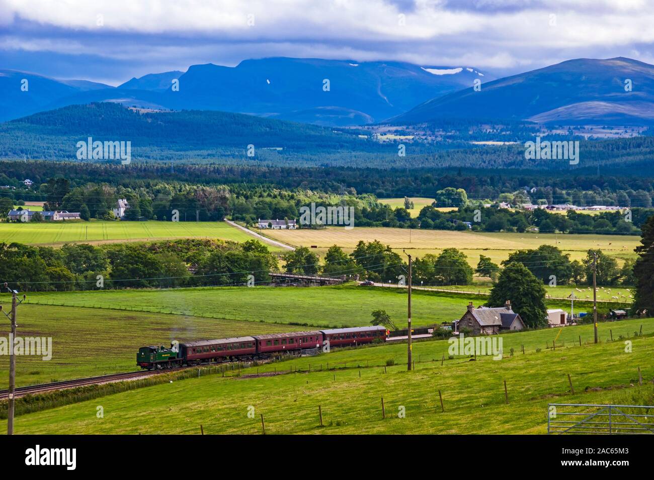 Strathspey Railway heritage train pulled by tank steam engine Braeriach ...