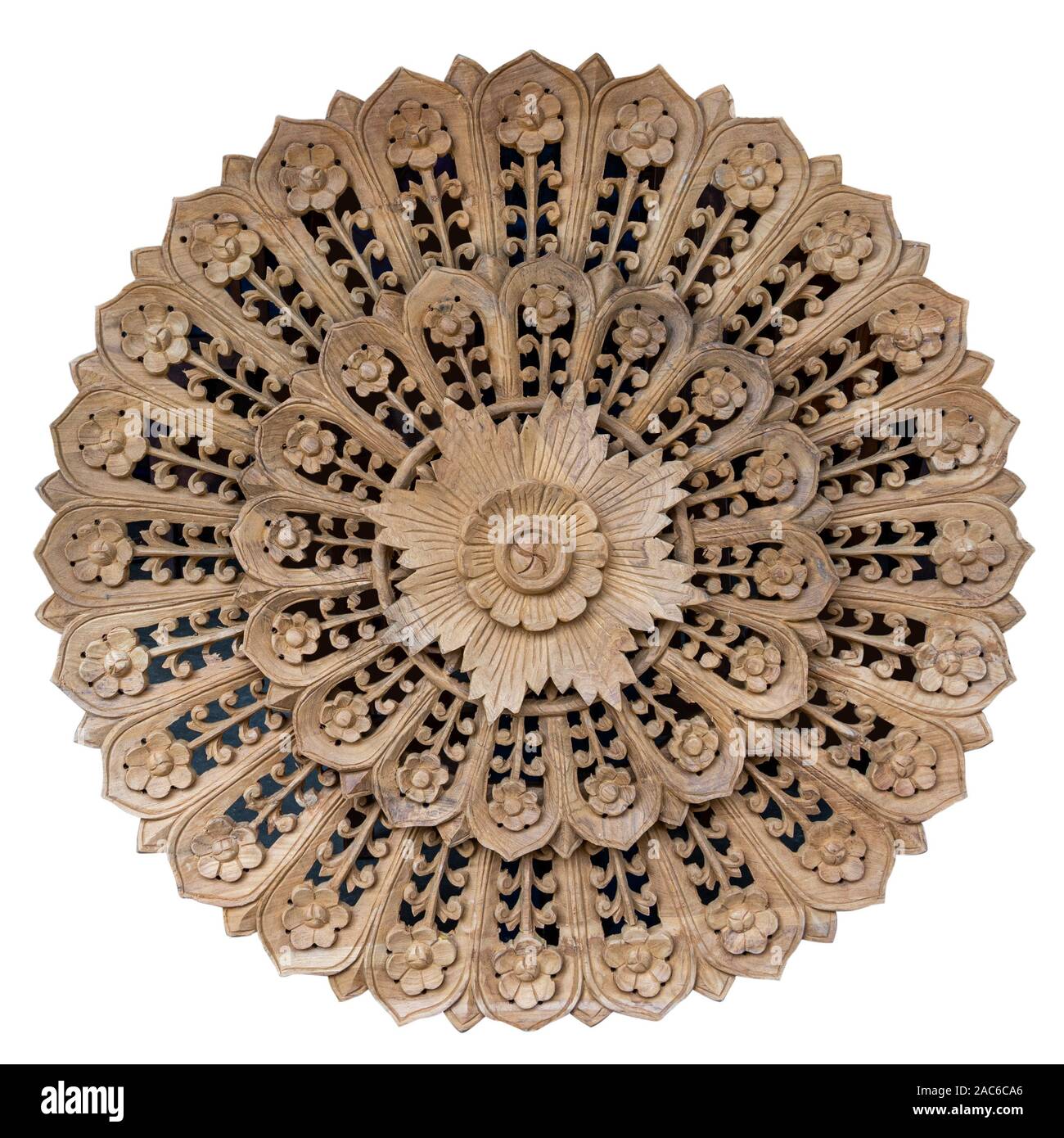 Wooden pattern of flower on carve teak wood in circle shape for ...