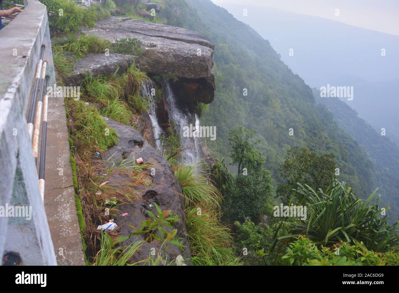 Close up of the water falls of Cherrapunjee Eco park with lots of trees ...