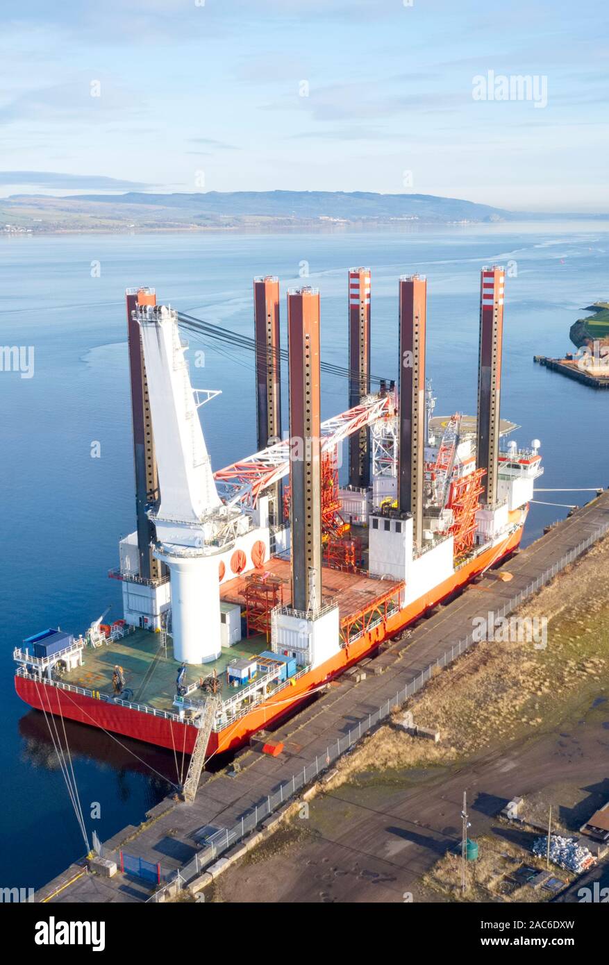 Barge ship crane construction at dock harbour in the sea ocean aerial ...