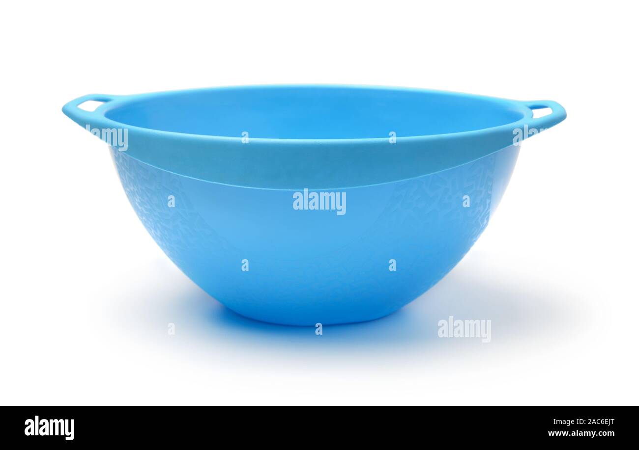 Blue deep plastic plate isolated on white background Stock Photo - Alamy
