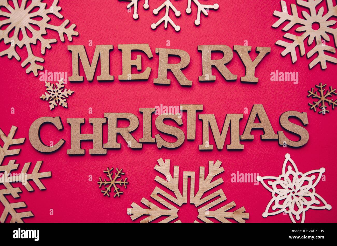 Flat lay Merry Christmas background.Red wallpaper with wooden letters ...