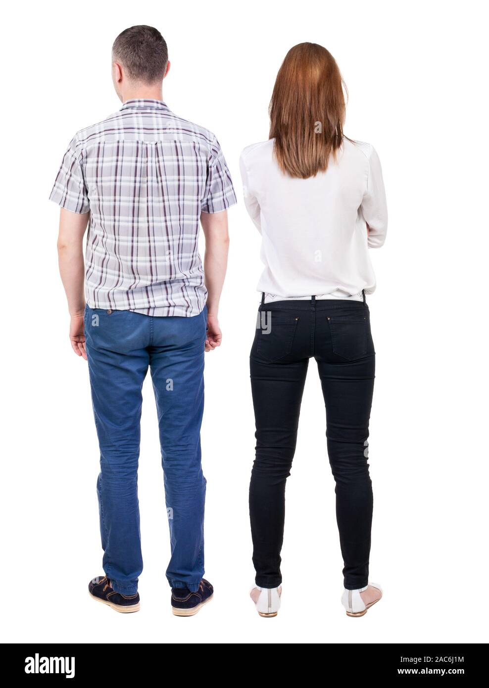 Back view of couple. beautiful friendly girl and guy together. Rear ...