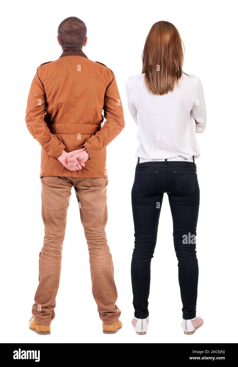 Back view of couple. beautiful friendly girl and guy together. Rear ...