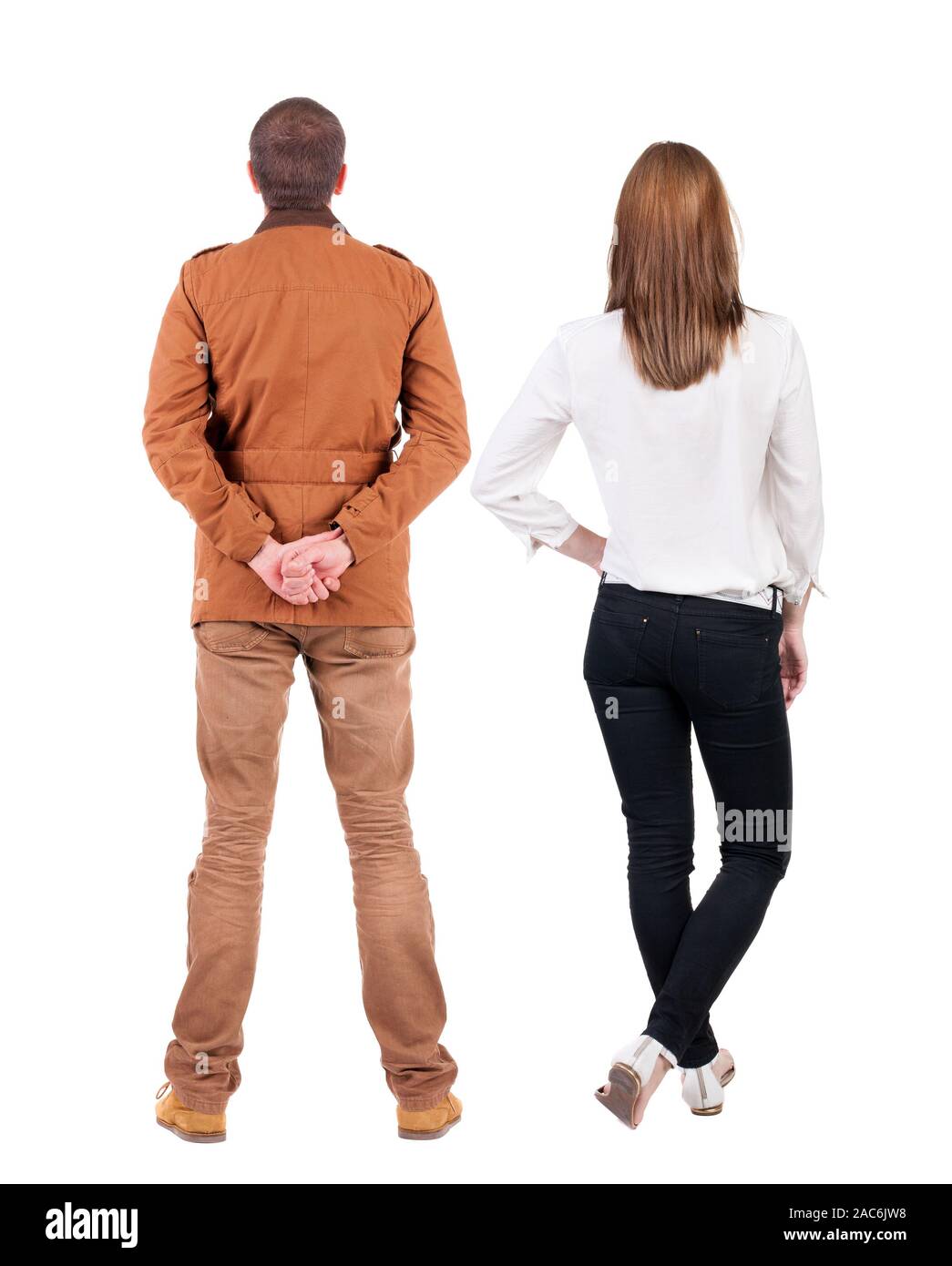 Back view of couple. beautiful friendly girl and guy together. Rear ...