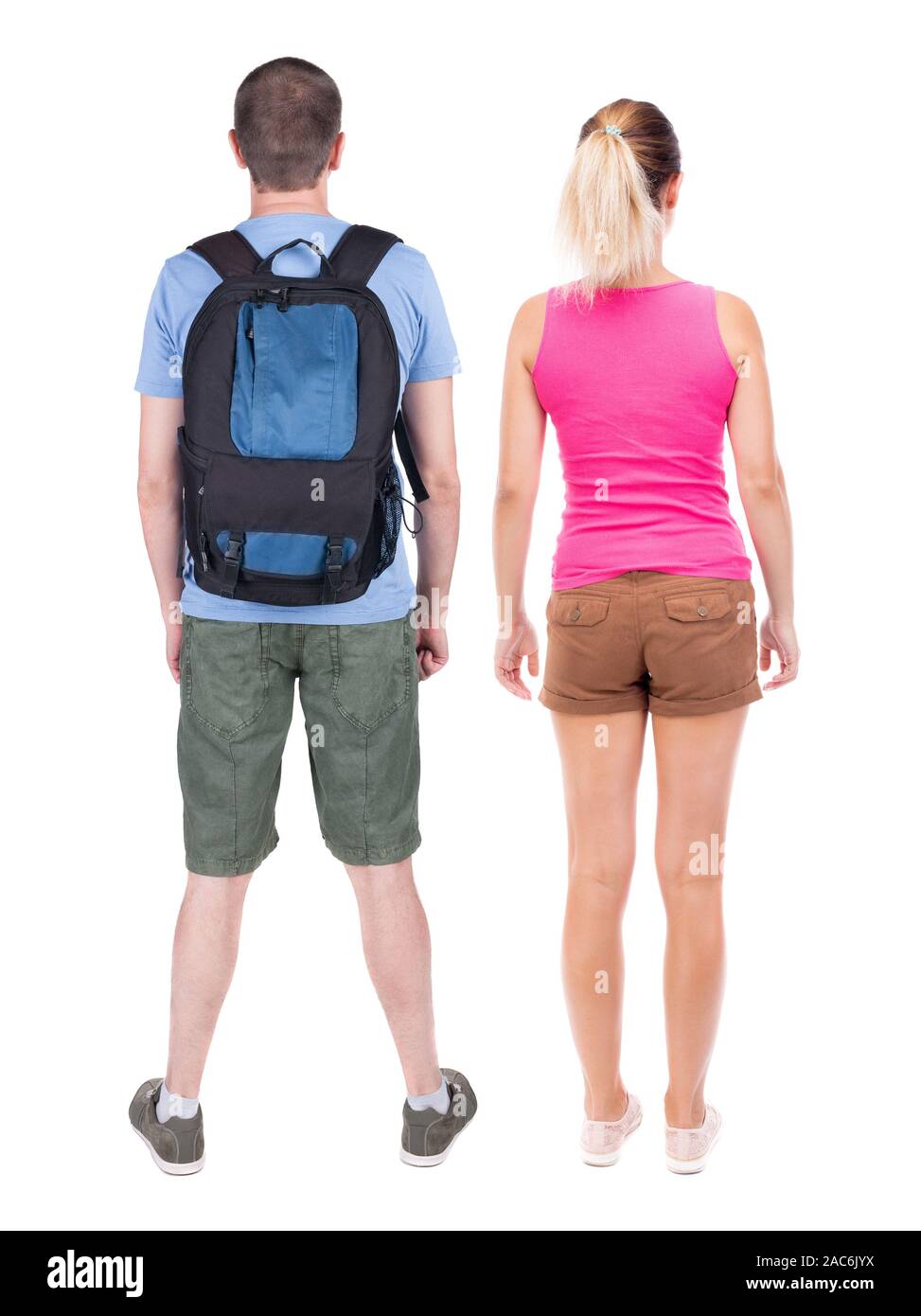 Back view of couple. beautiful friendly girl and guy together. Rear ...