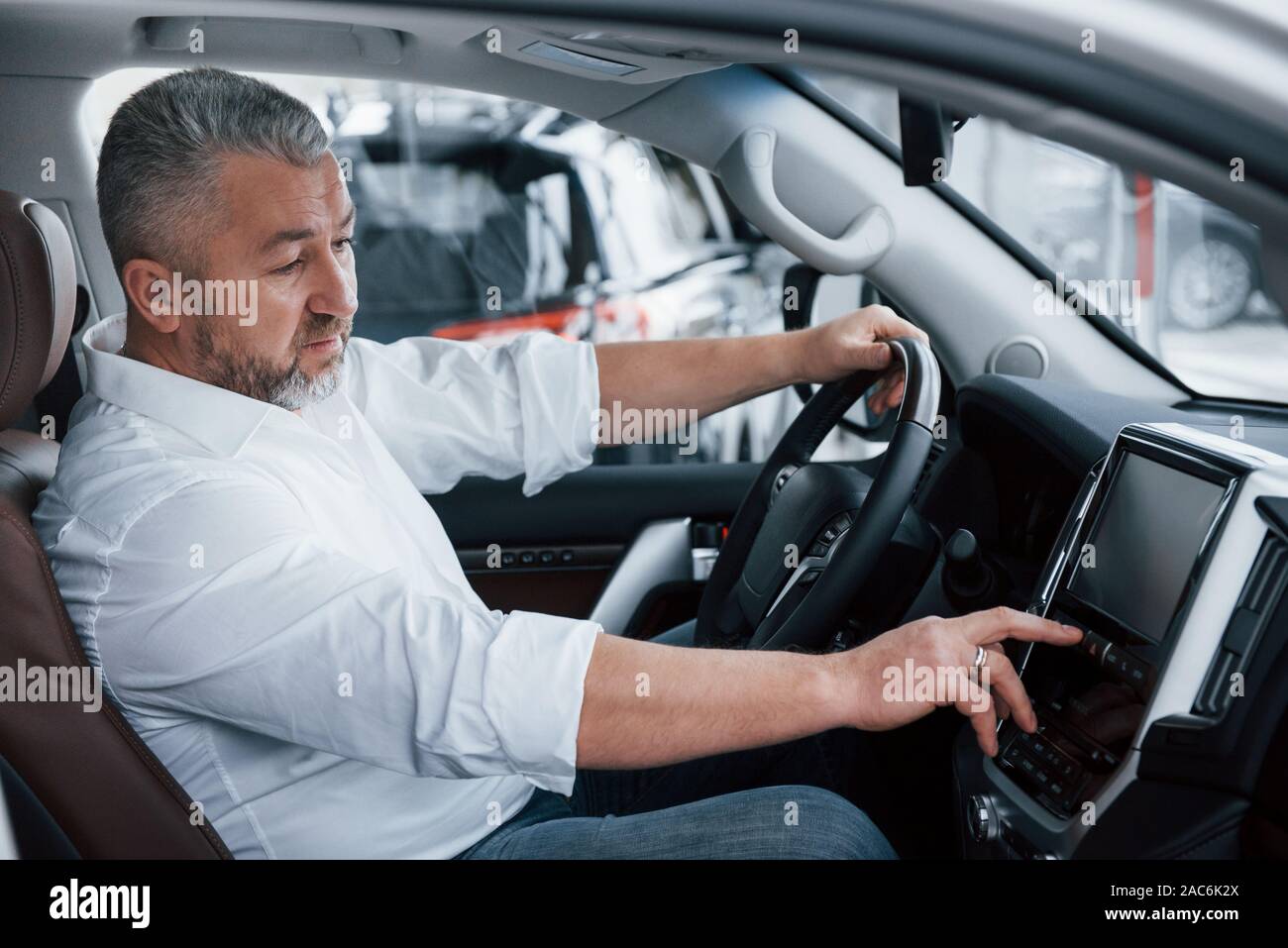 Pushing buttons hi-res stock photography and images - Alamy