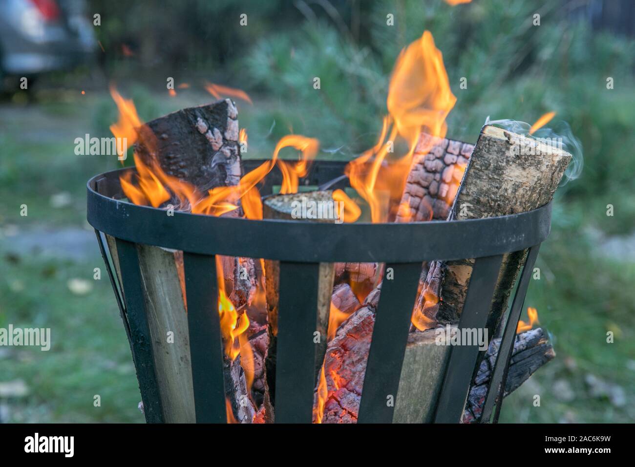 Fireplace in a metal hearth Stock Photo - Alamy