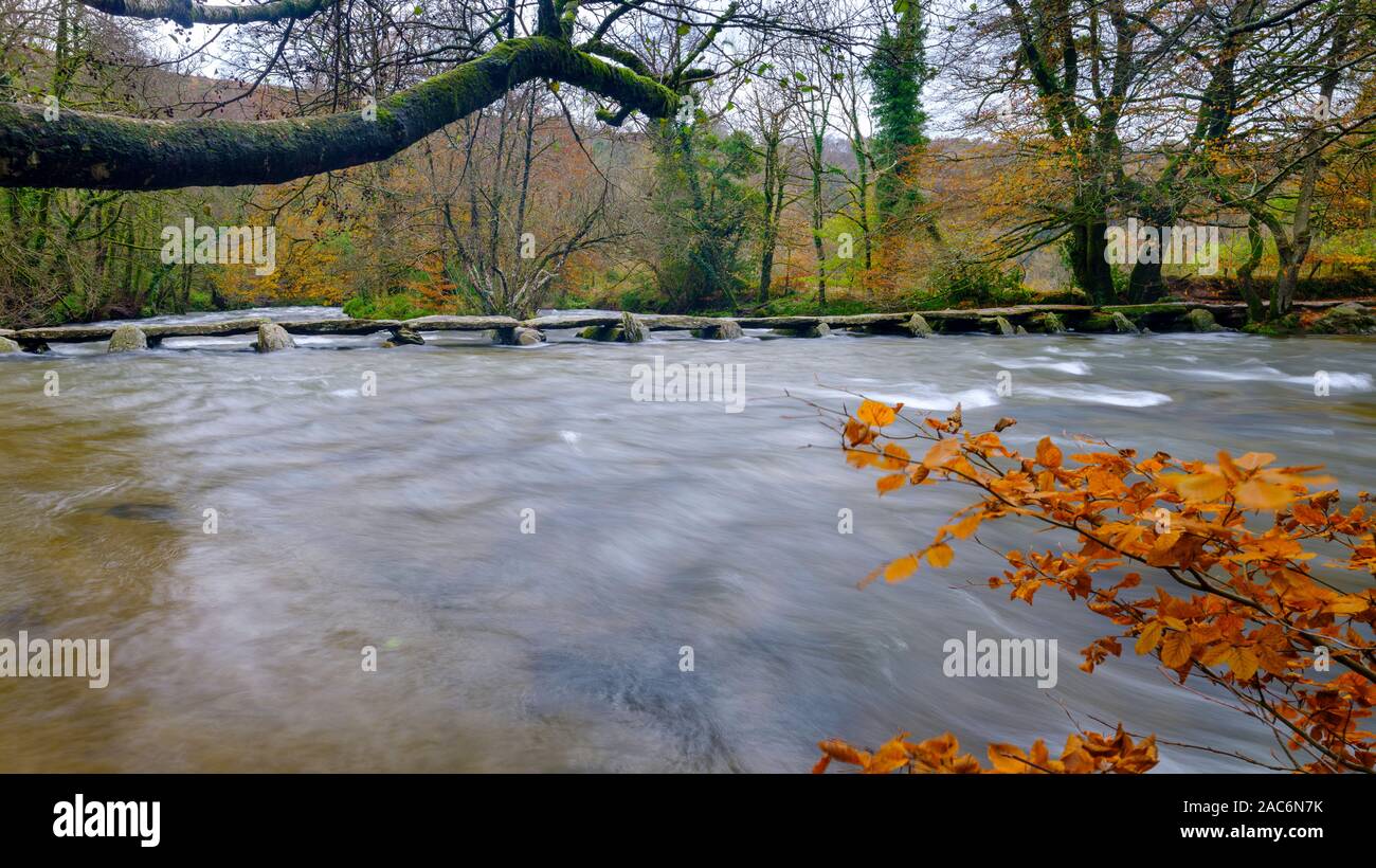 Exmoor, UK - November 15, 2019: The medieval clapper bridge over the ...