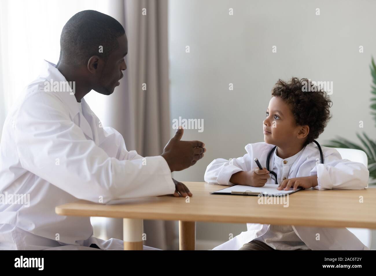 Children dressed doctors hi-res stock photography and images - Alamy