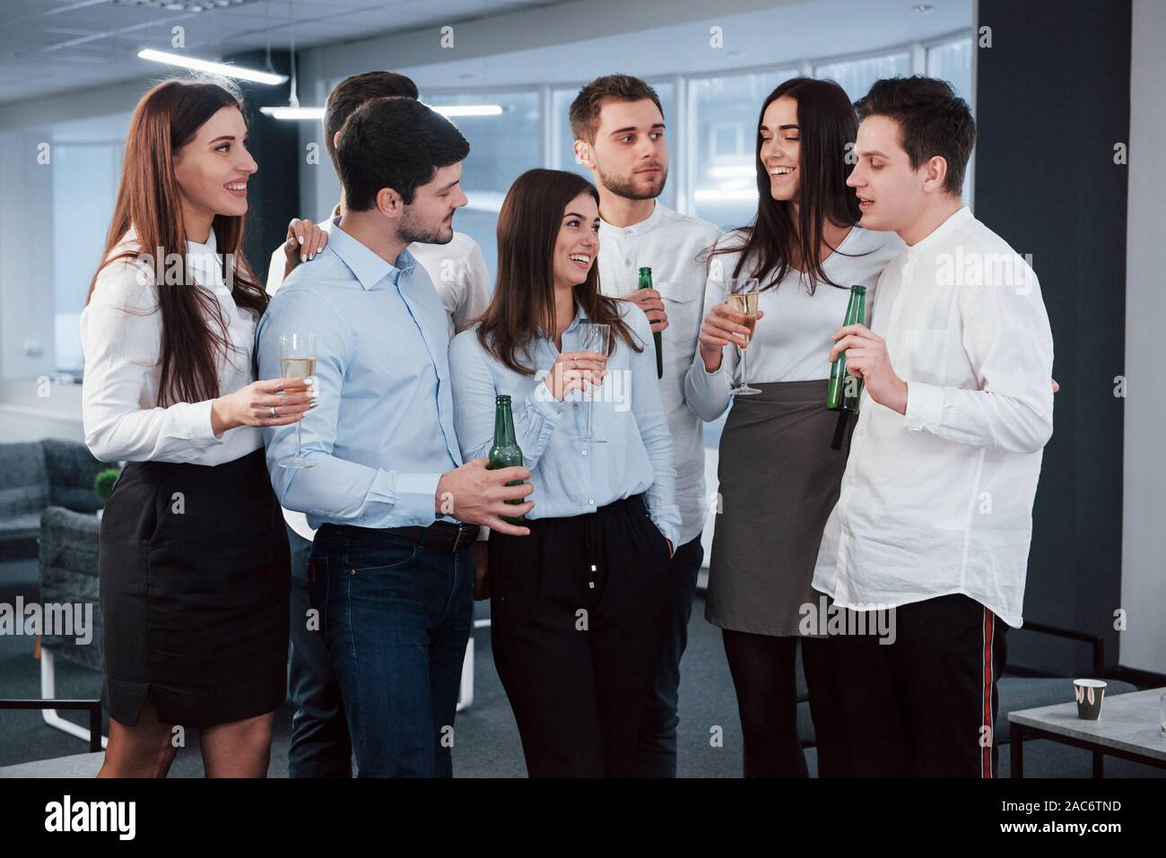 Drunk guy telling something interesting. Everyone is listening. Photo ...