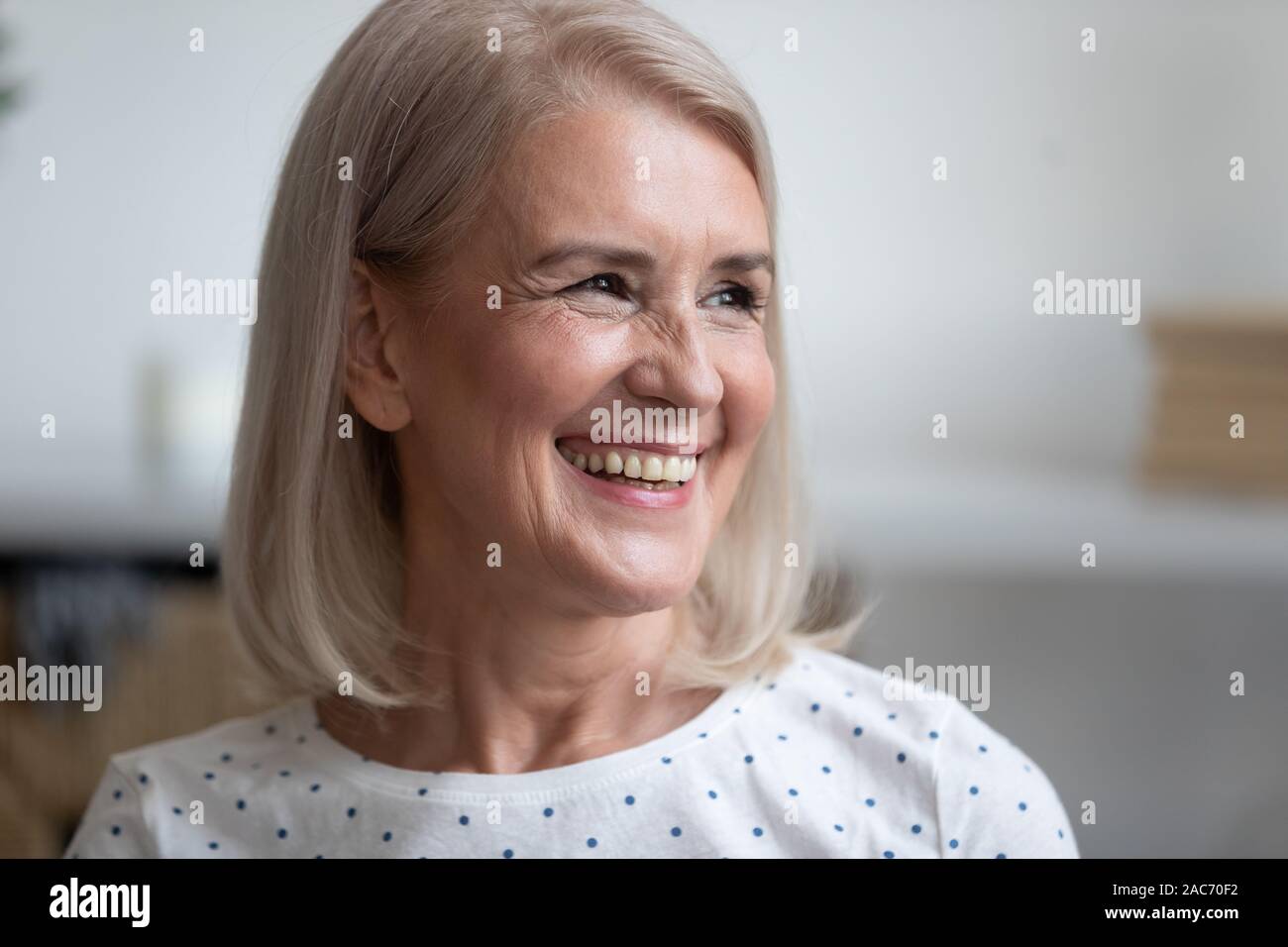 Middle aged woman laughing joyful hi-res stock photography and images - Alamy