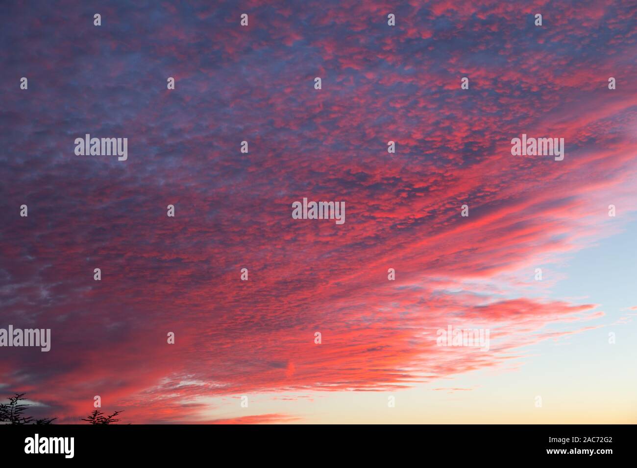 Landscape at twilight, dramatic sky, red clouds Stock Photo - Alamy