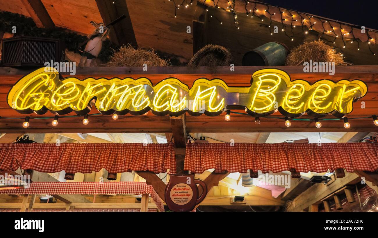 German Beer neon letters and illuminated sign outside a stall on a ...