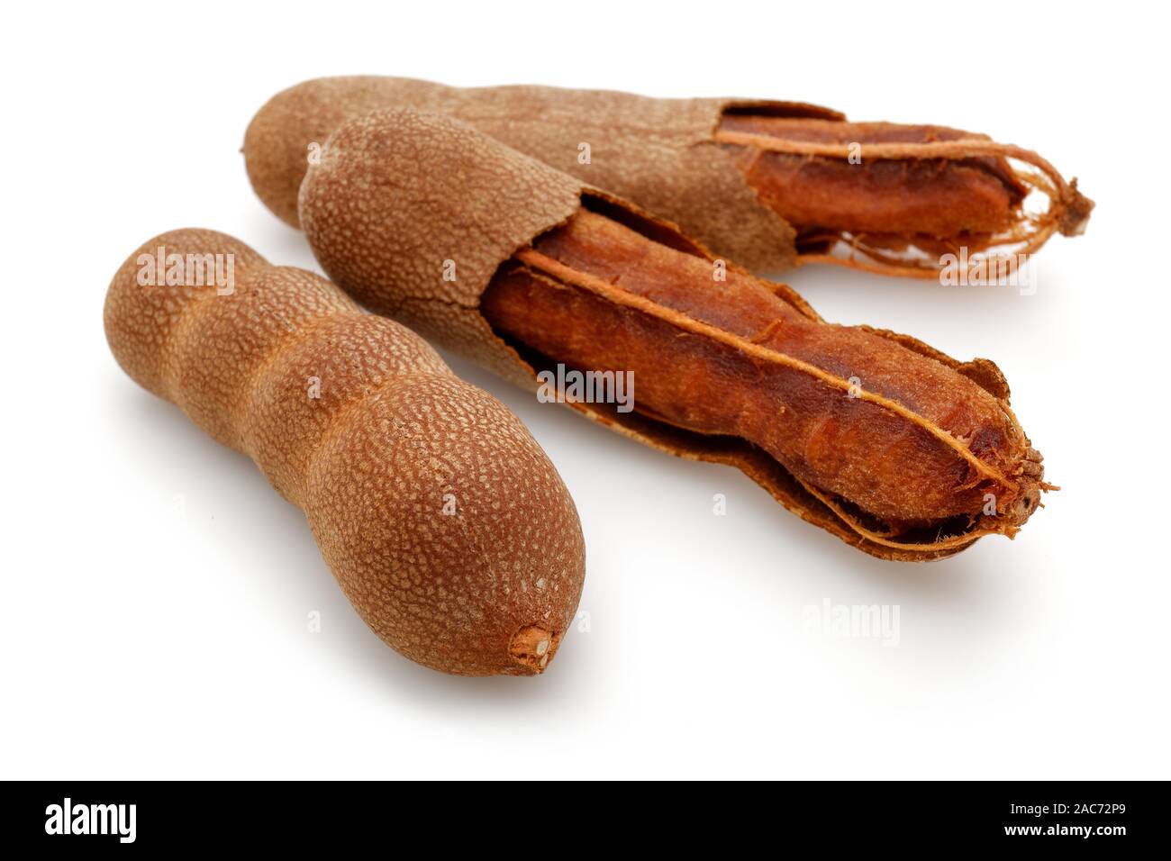 Fresh tamarind fruit isolated on white background Stock Photo - Alamy