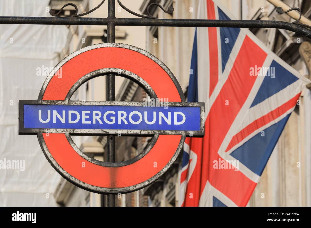 London Underground, iconic public transport tube sign with Union Jack ...