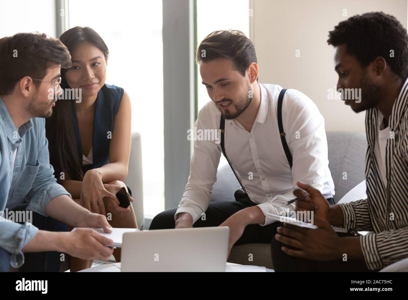 Team of professionals multiethnic company staff working on project ... Team of professionals multiethnic company staff working on project ...