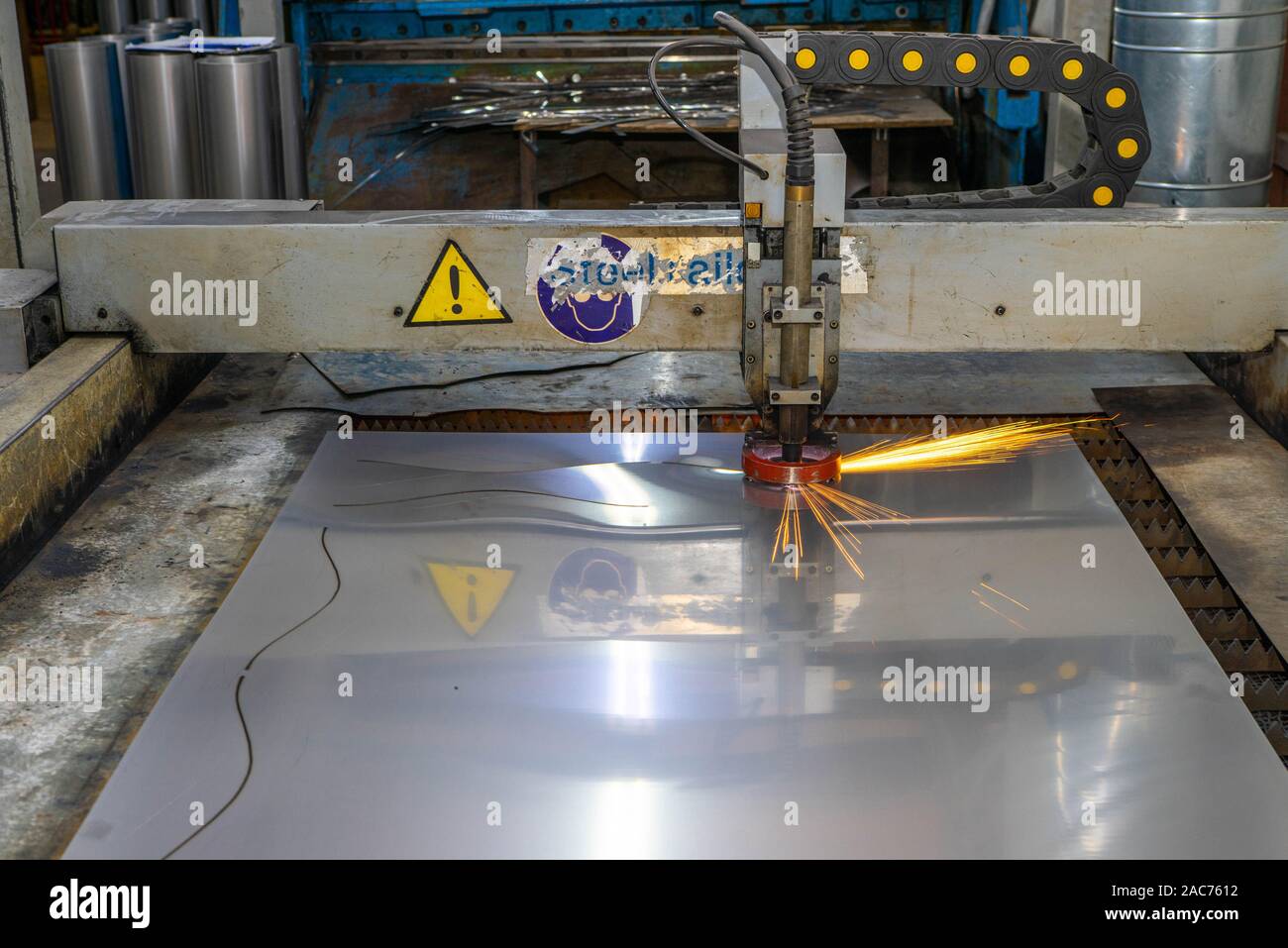 CLose-up of working metal processing machine. Plasma metal cutting ...