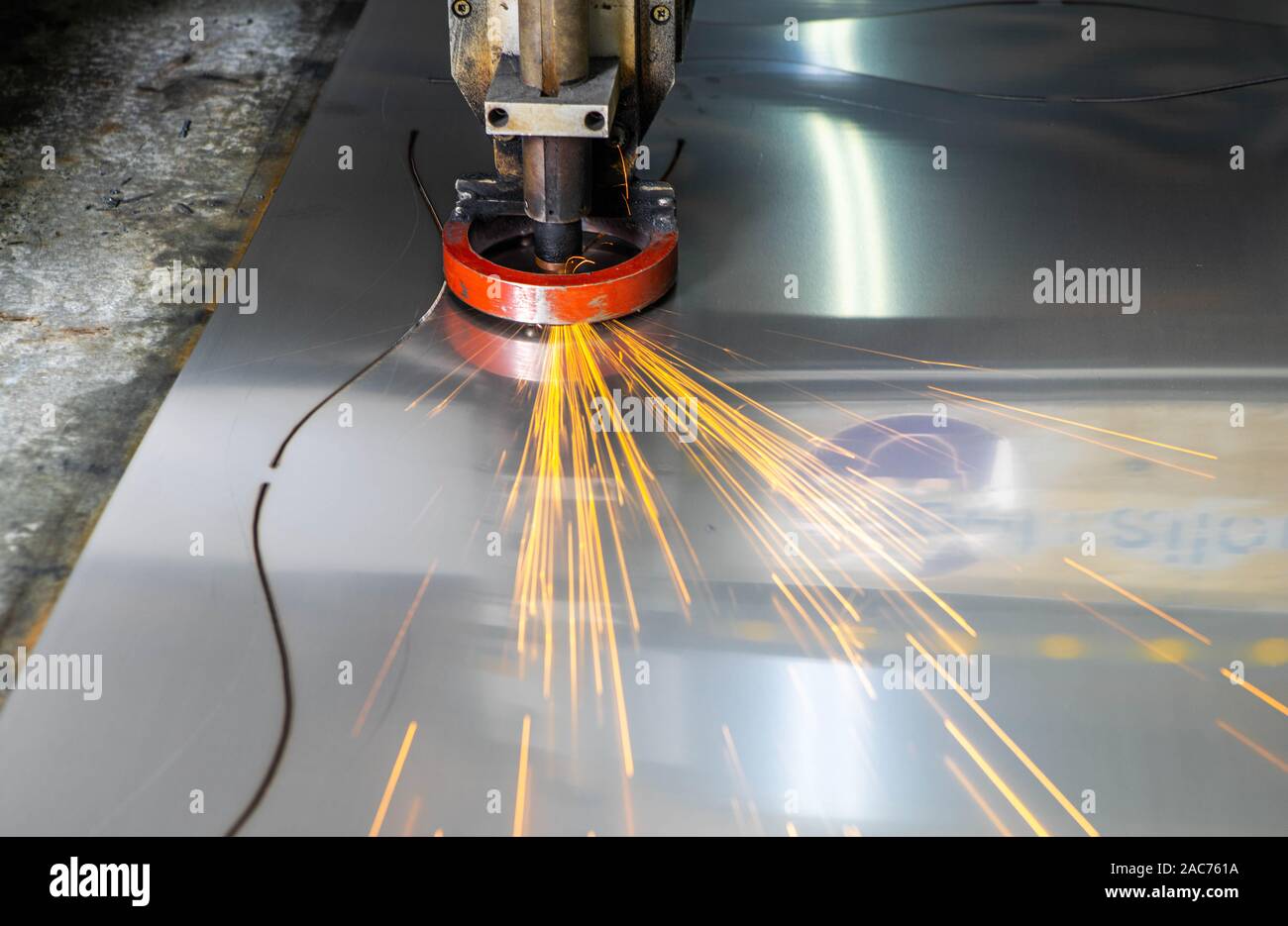 CLose-up of working metal processing machine. Plasma metal cutting ...