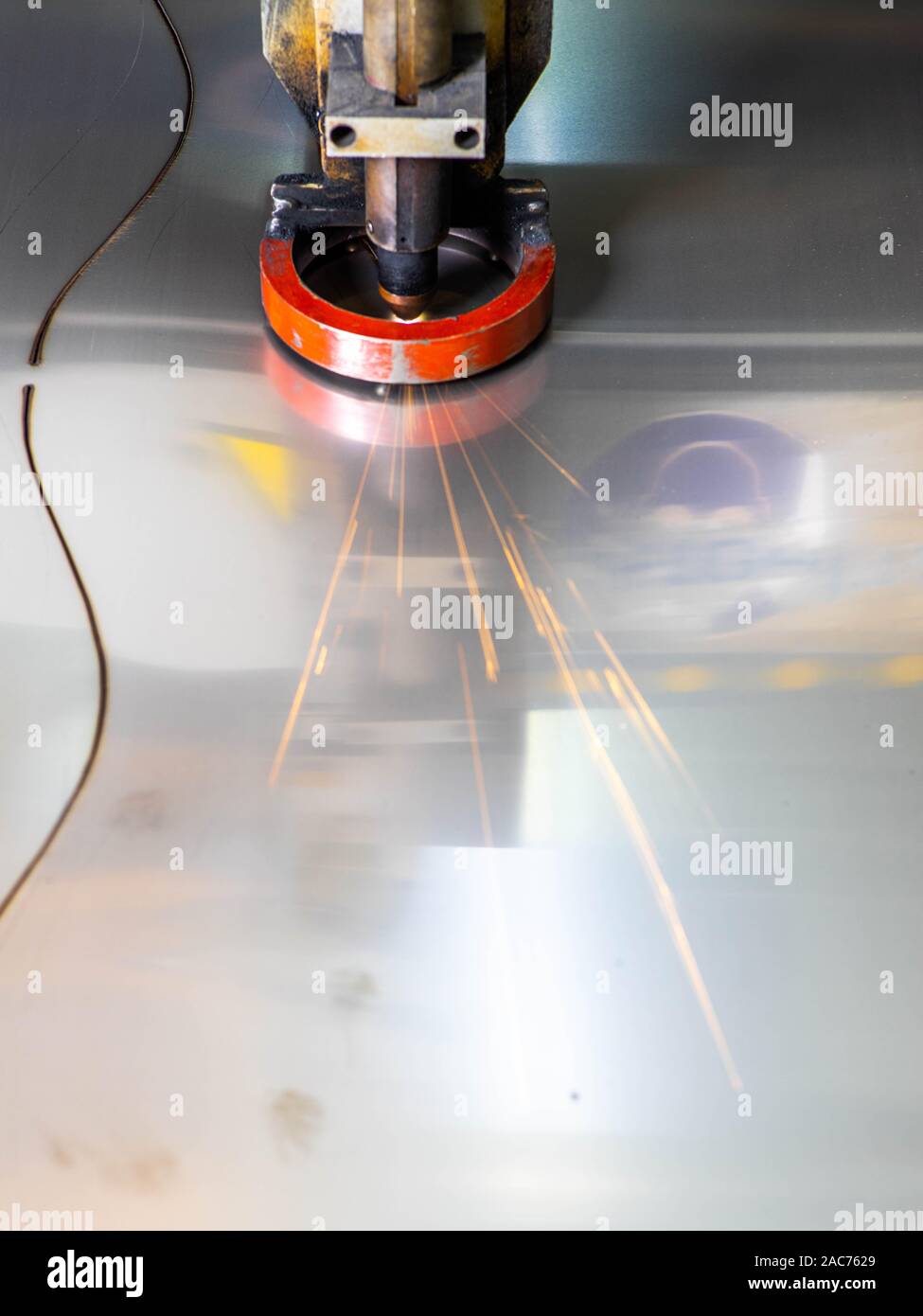 CLose-up of working metal processing machine. Plasma metal cutting ...