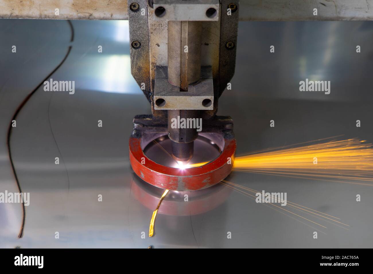 CLose-up of working metal processing machine. Plasma metal cutting ...