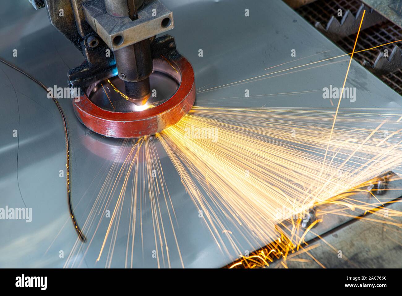 CLose-up of working metal processing machine. Plasma metal cutting ...