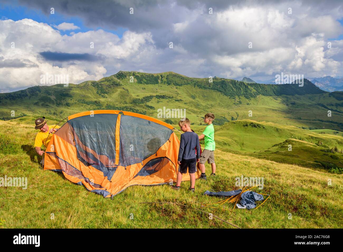 Tent setup for an overnight stay in the mountains Stock Photo - Alamy