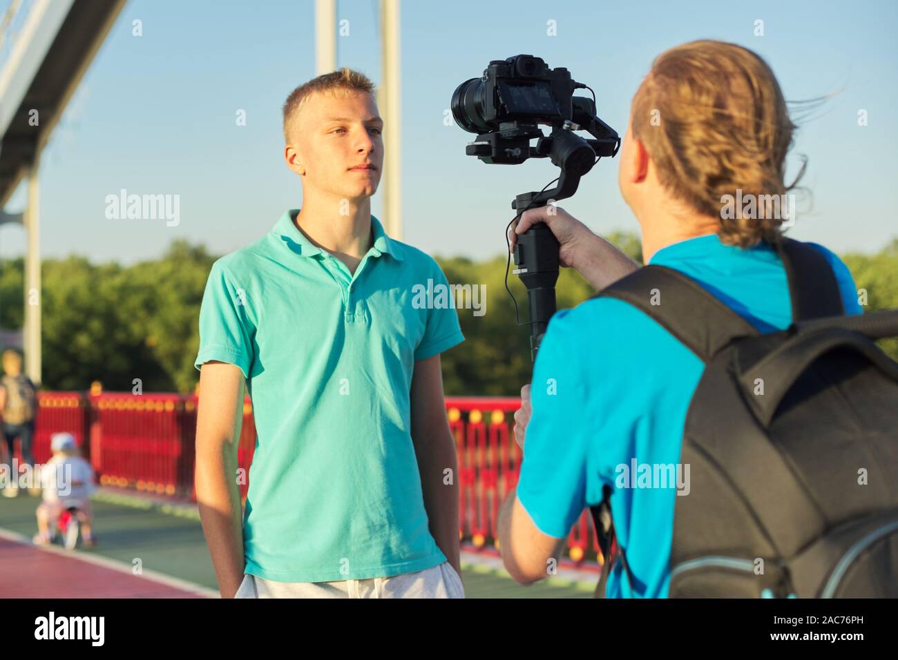 Cameraman shooting young attractive model hi-res stock photography and ...