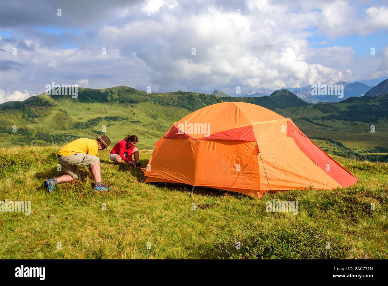 Tent setup for an overnight stay in the mountains Stock Photo - Alamy