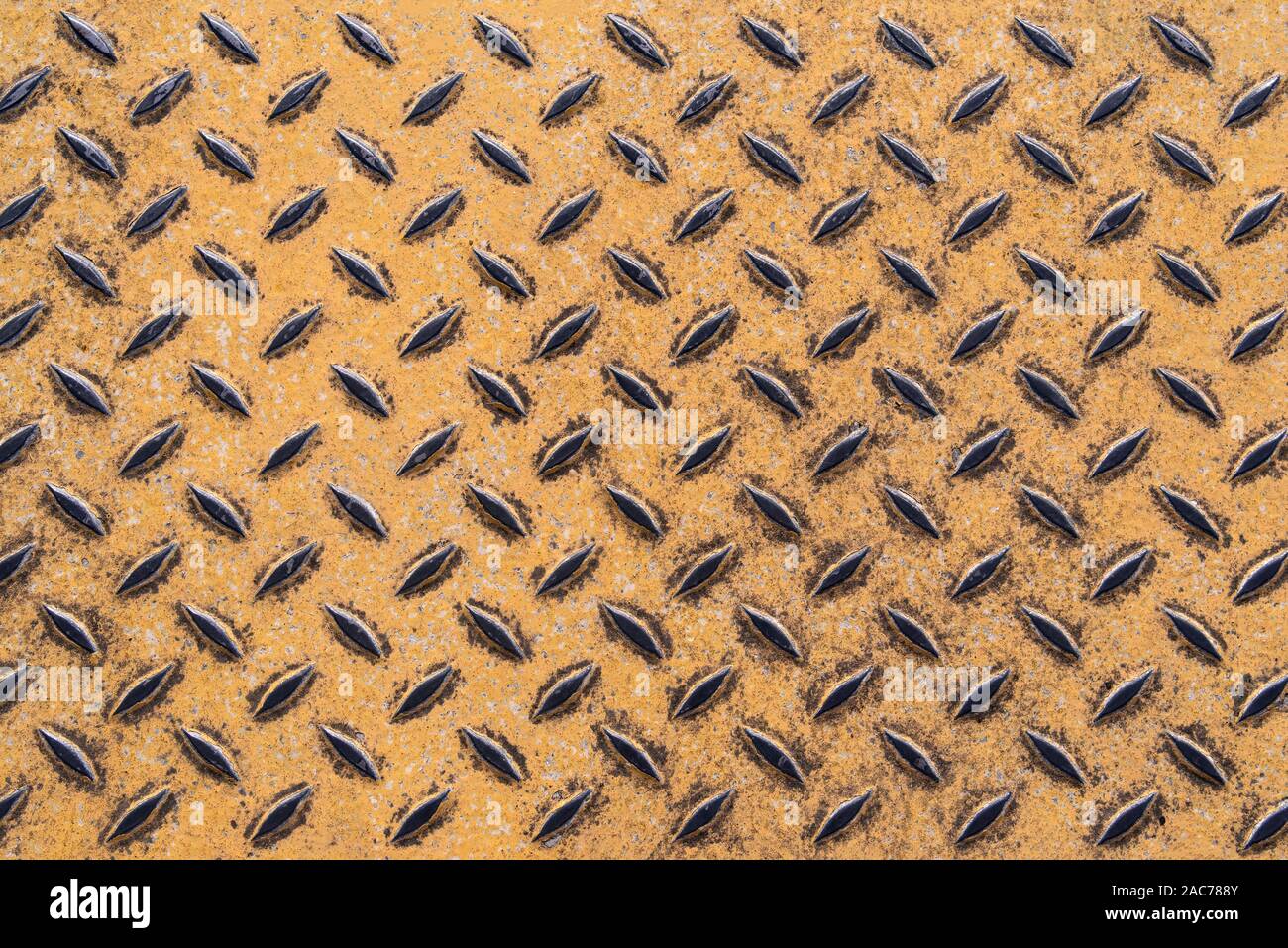 Industrial metal plate with yellow painted patterns Stock Photo - Alamy
