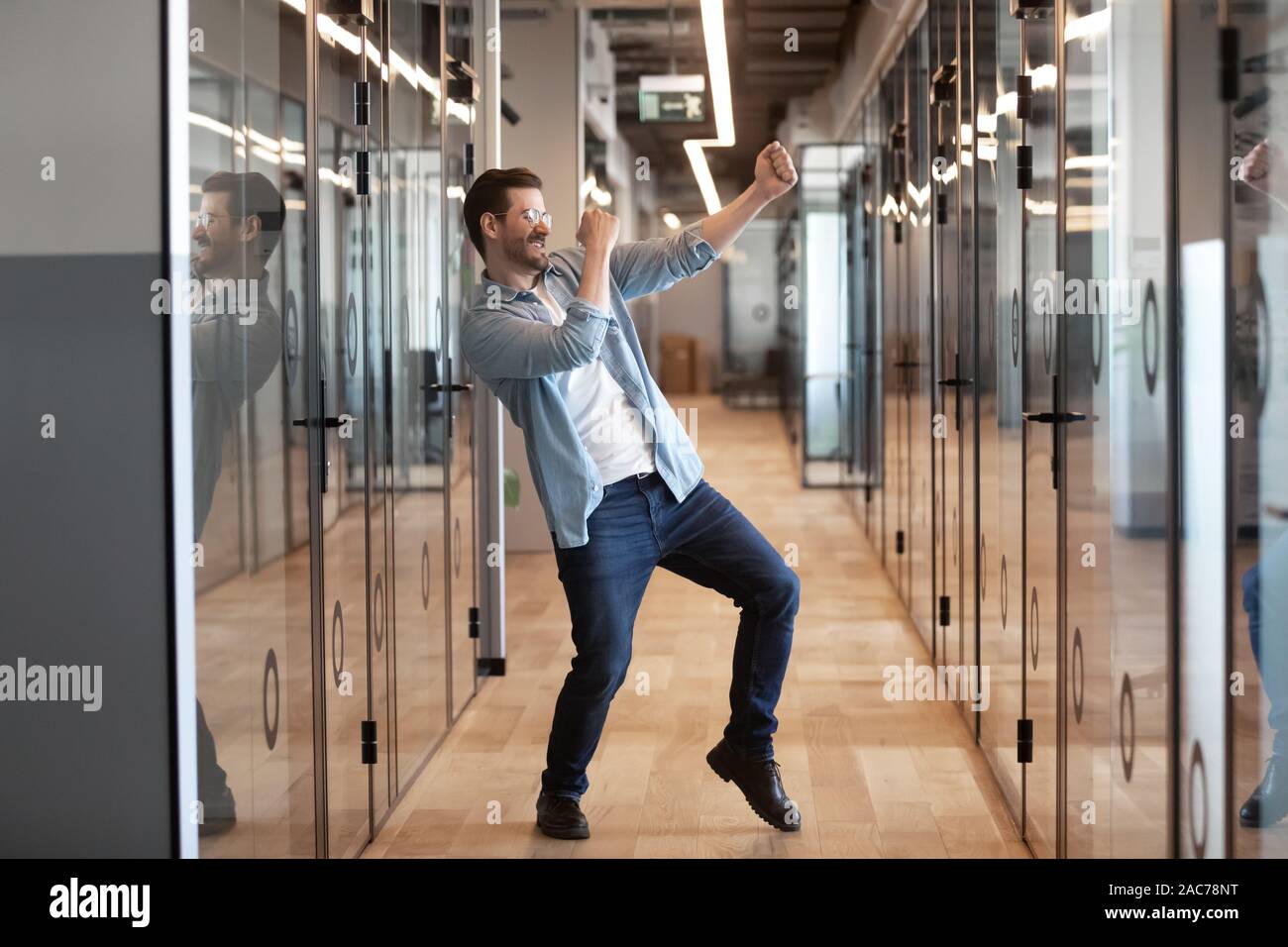 Business hall dancing man in hi-res stock photography and images - Alamy