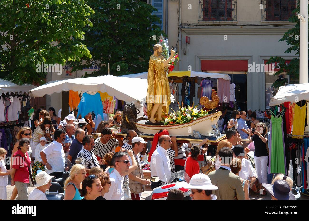 Statue of St. Peter, patron saint of fishermen, carried in procession ...