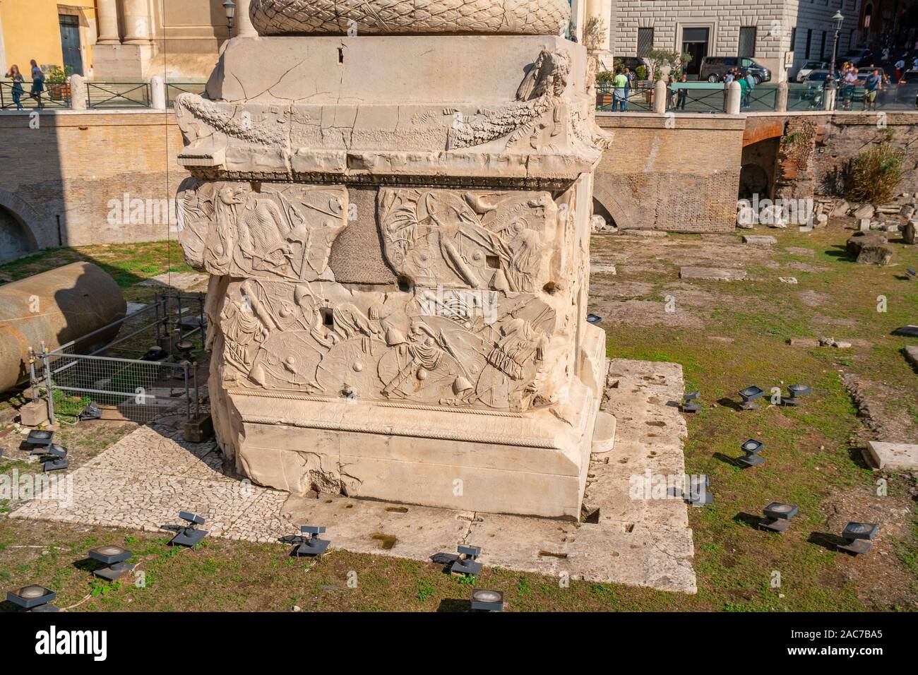 Traian Column detail with ruins of Cesar Forum in Rome. bottom of ...