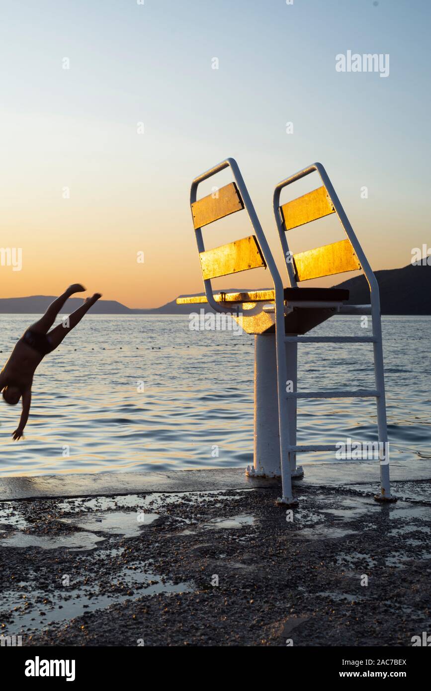 Boy on diving platform hi-res stock photography and images - Alamy