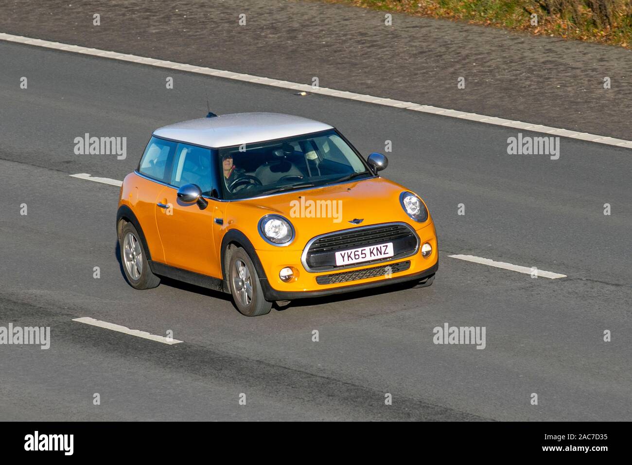 2015 orange Mini Cooper; Vehicular traffic, transport, modern vehicles ...