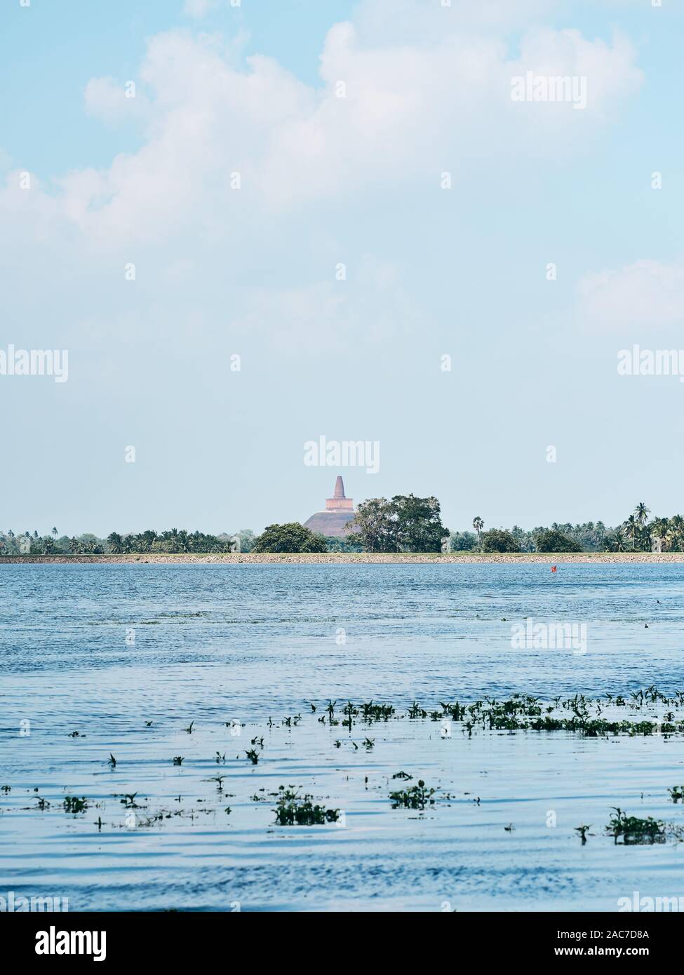 Abayagiriya Stupa in the distance across a lake Stock Photo - Alamy
