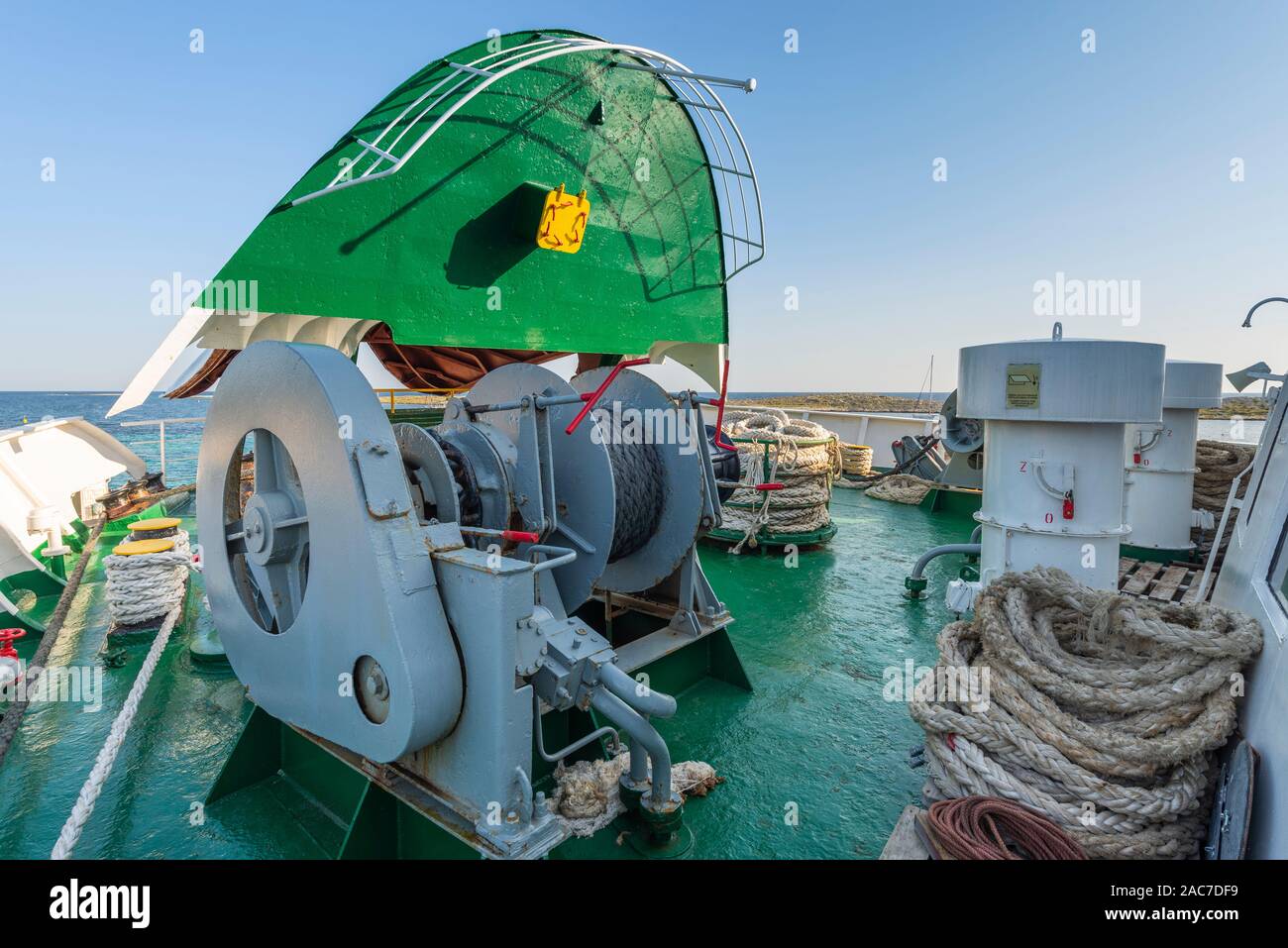 A car ferry stands with the bow folded up on the jetty of Premuda ...