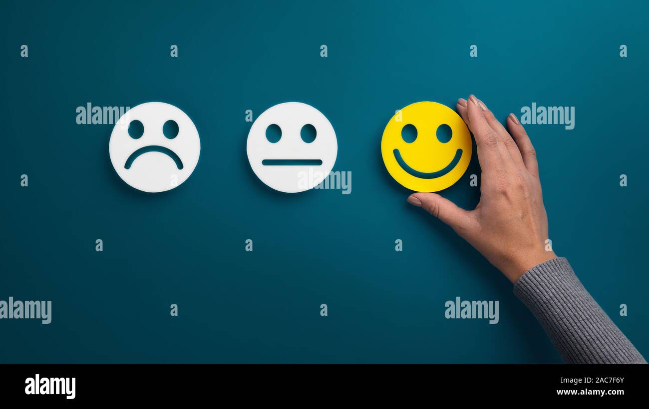 Smiley face sign woman hi-res stock photography and images - Alamy