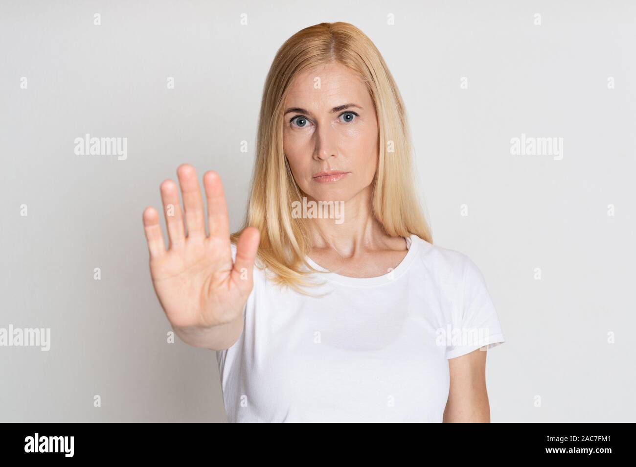 Stop serious mature woman hi-res stock photography and images - Alamy