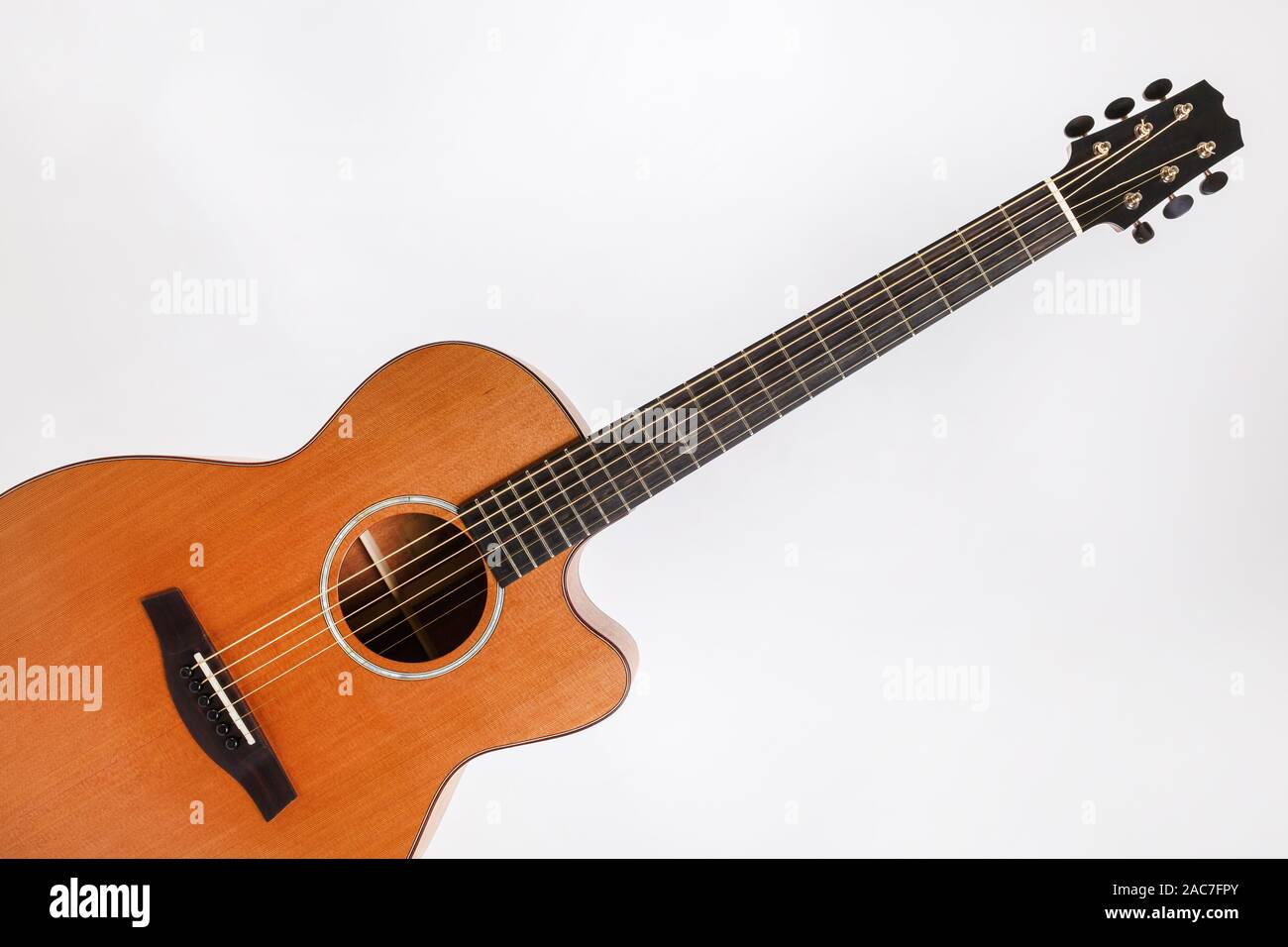 wood texture of lower deck of six strings acoustic guitar on white ...
