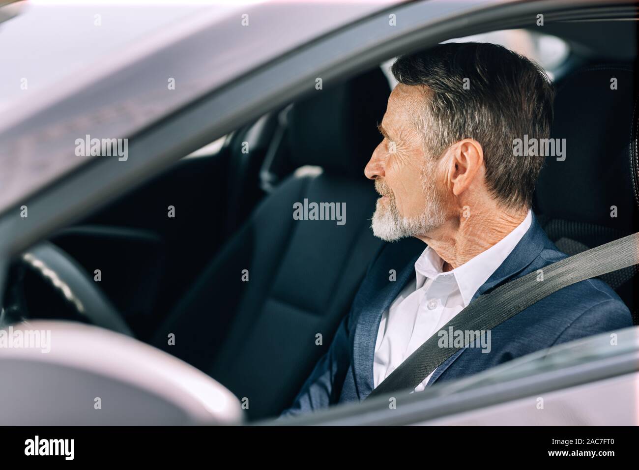 Handsome bearded driver sitting hi-res stock photography and images - Alamy