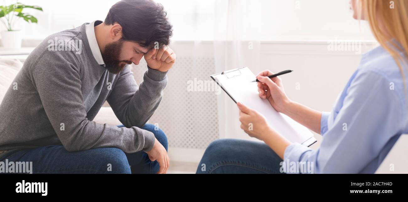Desperate millennial man getting psychological help at therapist Stock ...