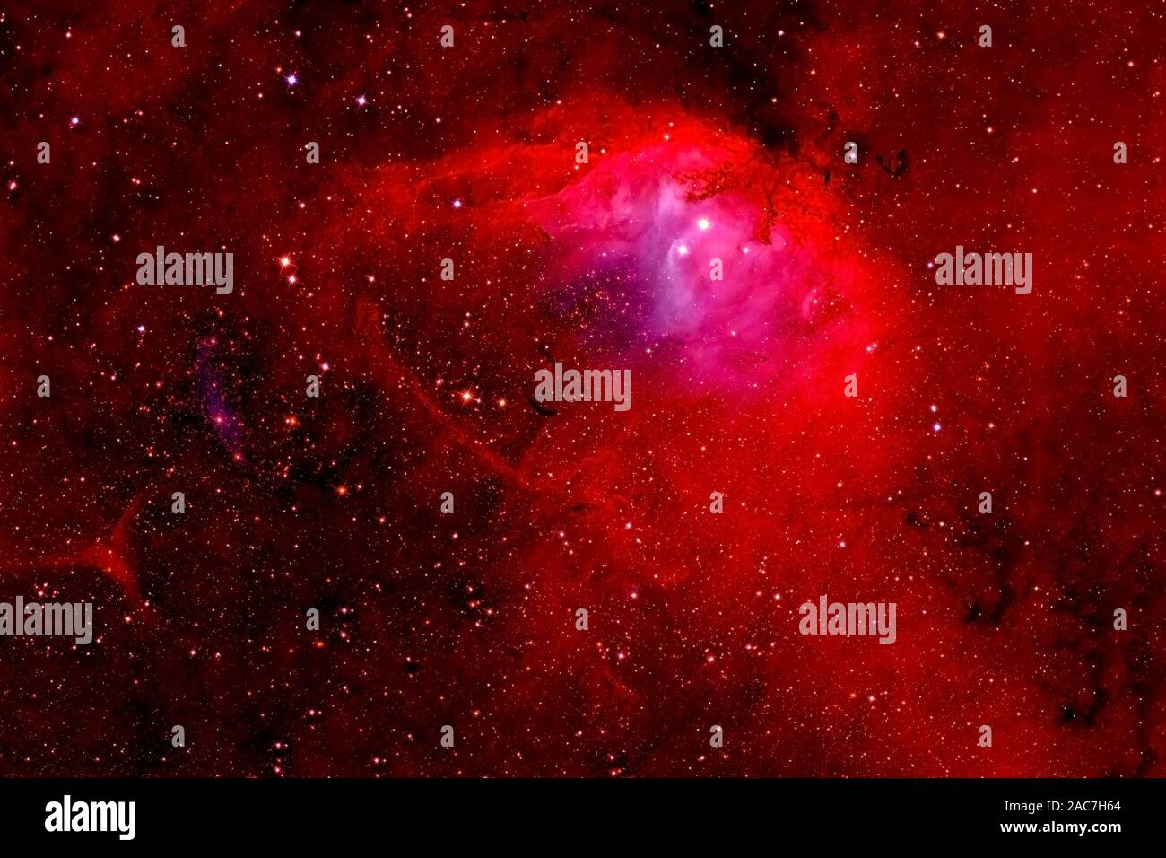 Beautiful distant galaxy of red color with a bright phase. Elements of ...