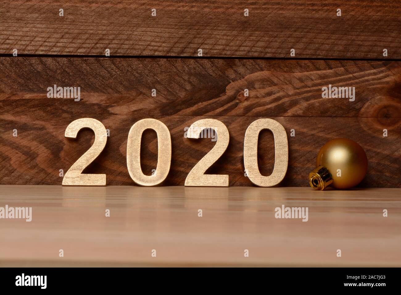 New Year 2020, numbers in golden colored wood Stock Photo - Alamy