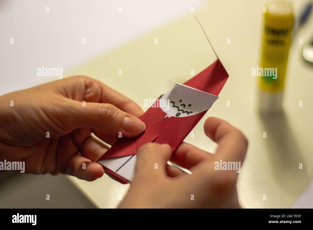 Making a paper Christmas figurine Stock Photo - Alamy