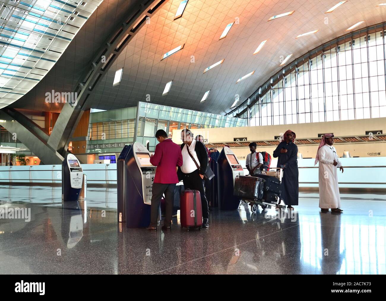 Doha, Qatar - Nov 24. 2019. Smart check-in Departure Area of Hamad ...