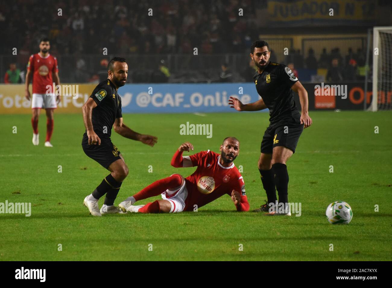 Ahly's Ahmed Fathi and Etoile's Yassin Chikhaoui in action during the ...
