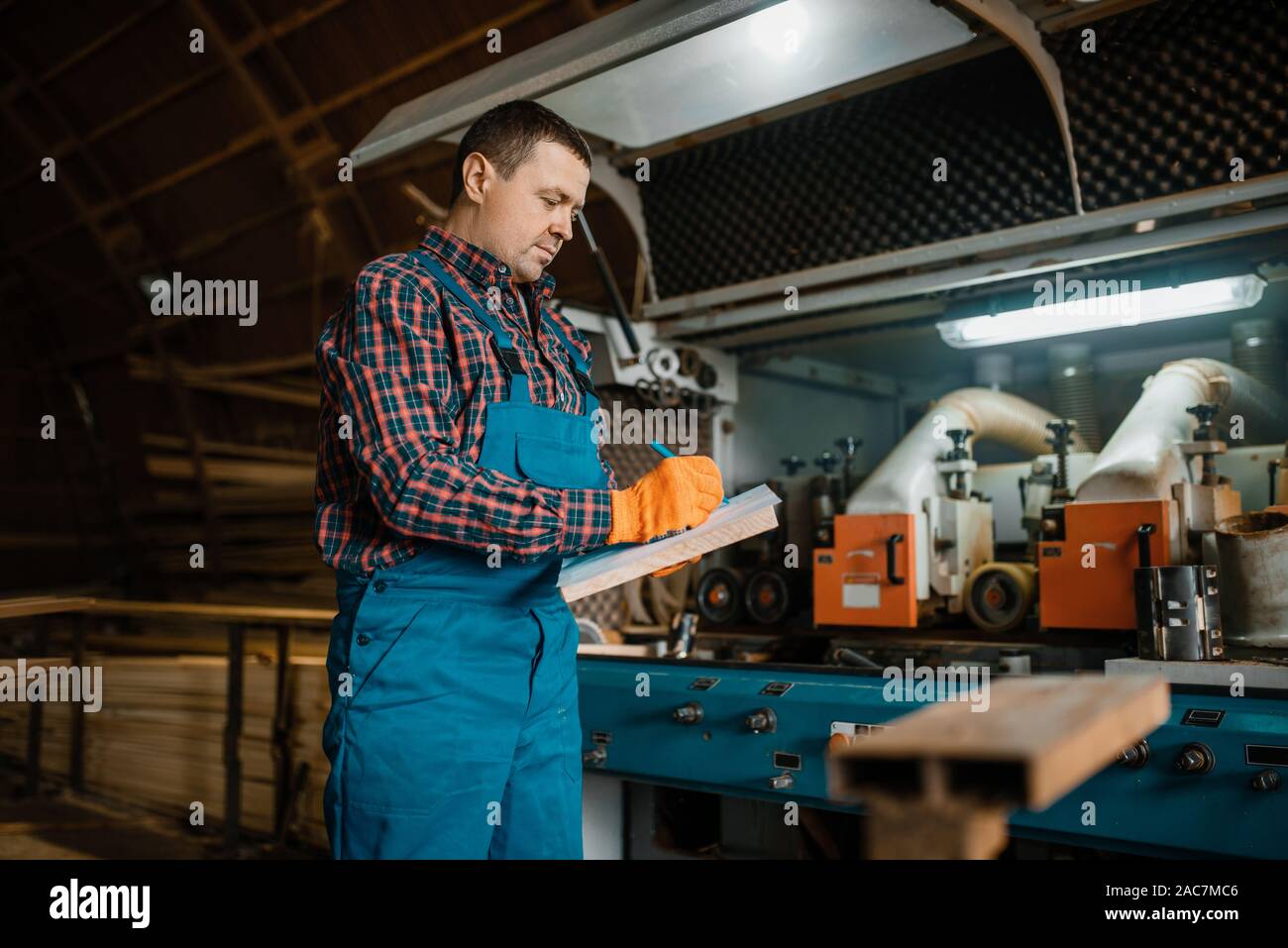 Male carpenter in uniform hi-res stock photography and images - Alamy
