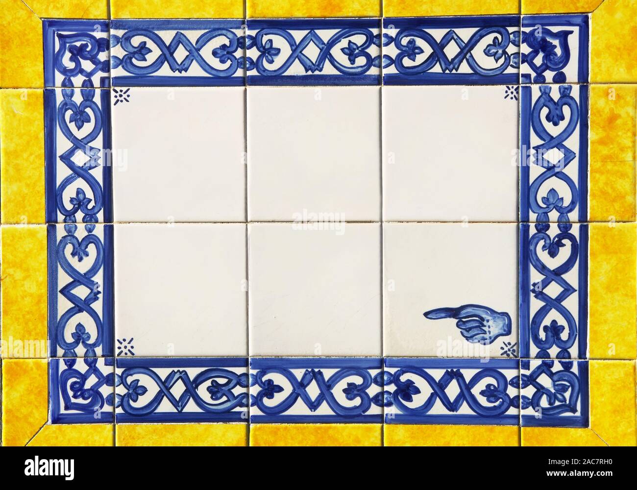 plaque of yellow and blue portuguese tiles Stock Photo - Alamy