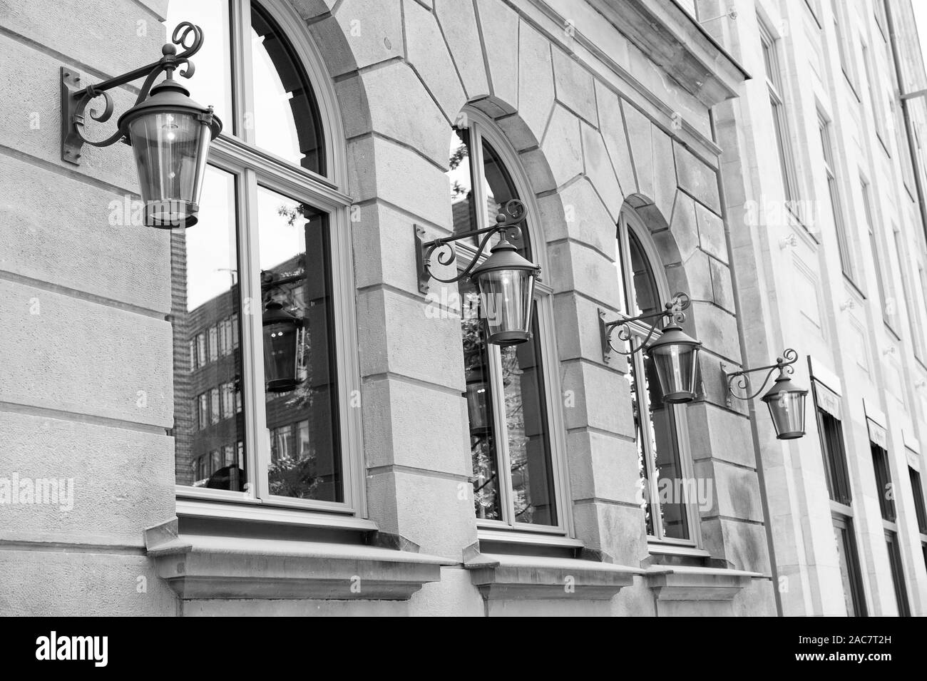 Street light. Retro vintage streetlights on building with windows ...